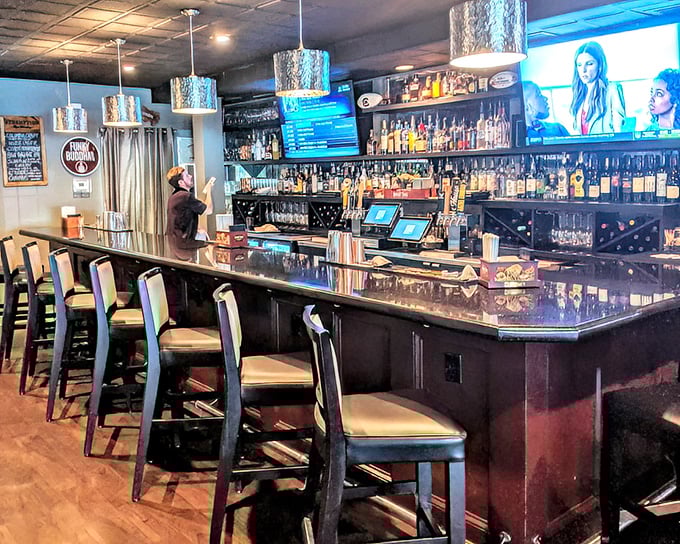 Not just a bar, but a community gathering spot where bottles stand like soldiers ready for duty and conversations flow as smoothly as the drinks.