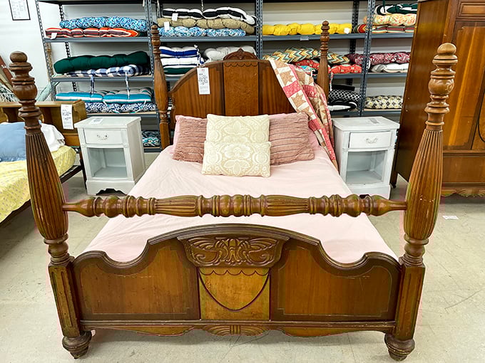 This four-poster bed isn't just furniture—it's practically time travel to an era when bedrooms had genuine character.