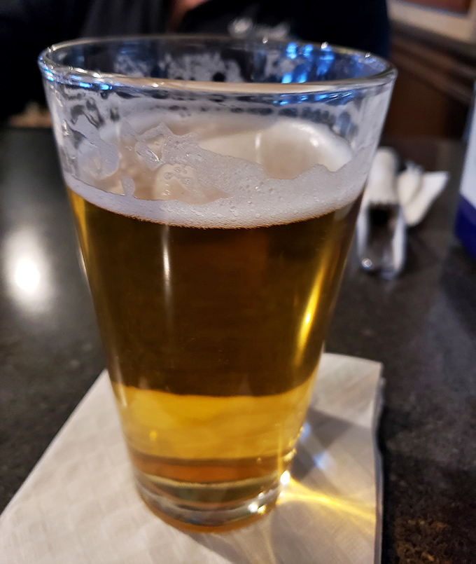 A perfectly poured beer awaits its destiny – to wash down whatever delicious creation you've ordered. Simple pleasures are often the most satisfying.