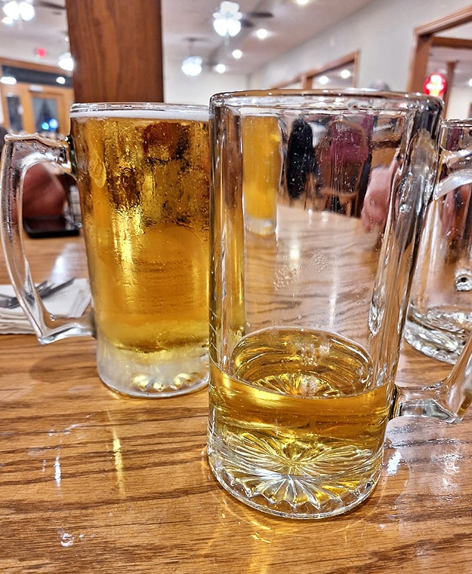 Cold beer in frosty mugs—sometimes the simplest pleasures are the most profound. Like liquid gold waiting to complement whatever comfort food you've chosen.