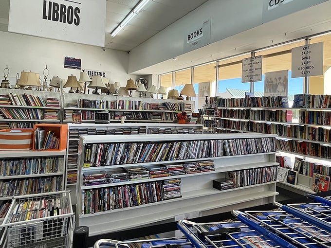 The literary corner—where paperbacks and DVDs wait for their sequel: life in your home. "Libros" for everyone, proving good stories transcend language.