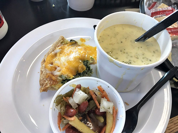 A perfect lunch trifecta—quiche, soup, and bean salad. This plate doesn't just feed your body; it nourishes your belief that simple food done right is culinary genius.