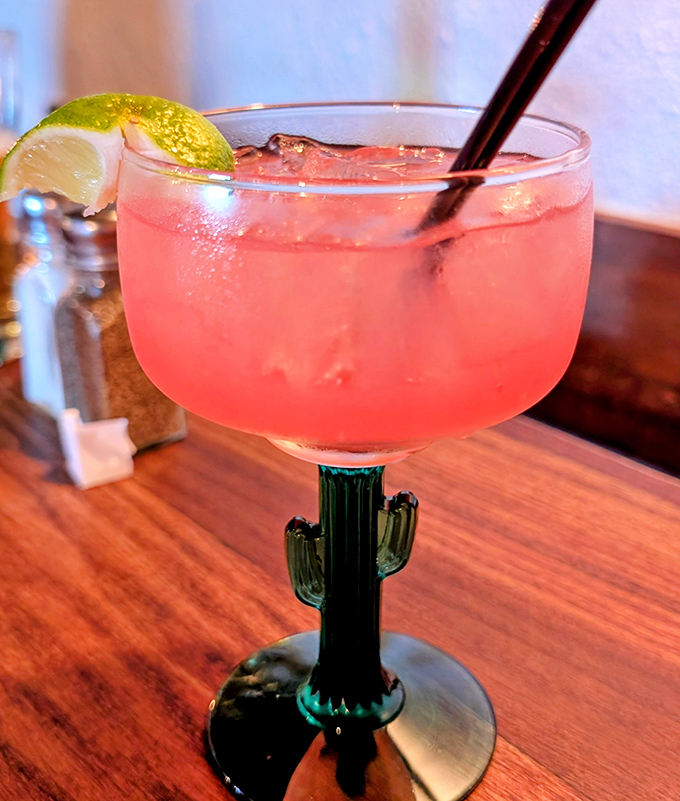 The cactus-stemmed margarita isn't just Instagram bait—it's a sunset-colored promise of Southwest hospitality in liquid form.