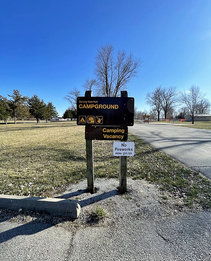 The campground welcome sign—nature's version of "vacancy" never looked so inviting. Adventure starts here.