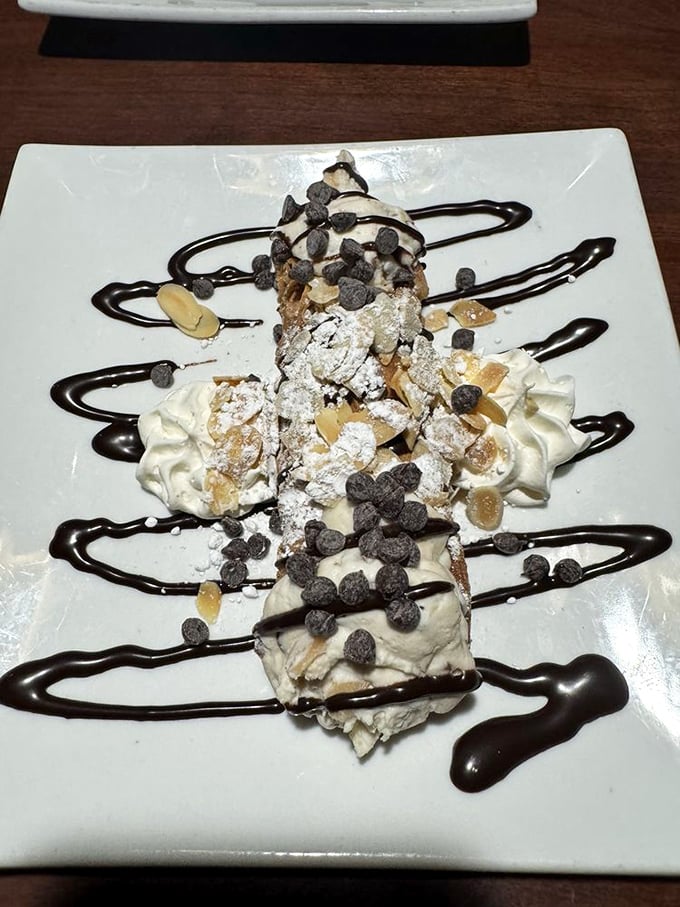 This cannoli isn't just dessert—it's architecture, sculpture, and poetry all wrapped in a crispy shell and dusted with powdered dreams.