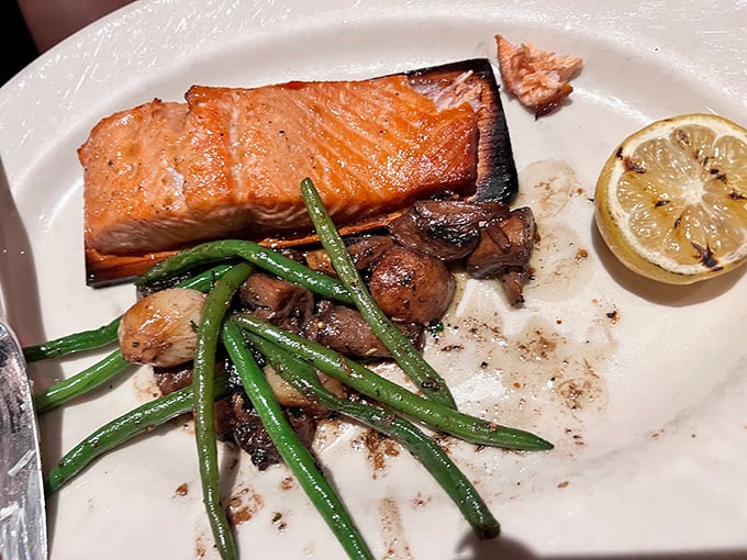 Cedar-planked salmon that's absorbed just enough smokiness to make you wonder if fish have been missing their true calling all along.