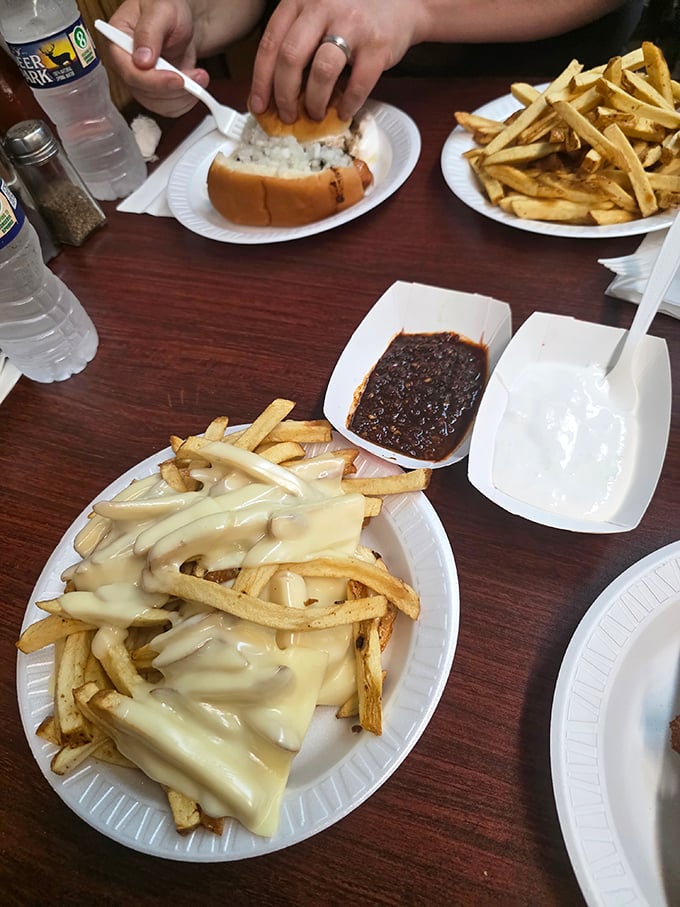 Cheese fries that don't mess around with pretentious toppings—just honest potatoes embraced by a blanket of melted goodness.