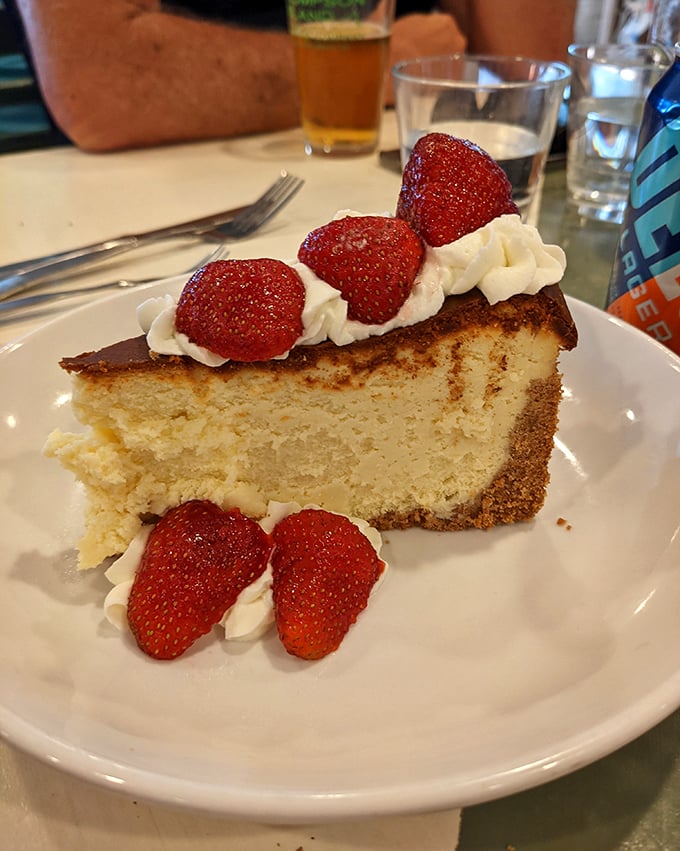 This cheesecake topped with strawberries isn't just dessert – it's the sweet finale to a seafood symphony that deserves a standing ovation.