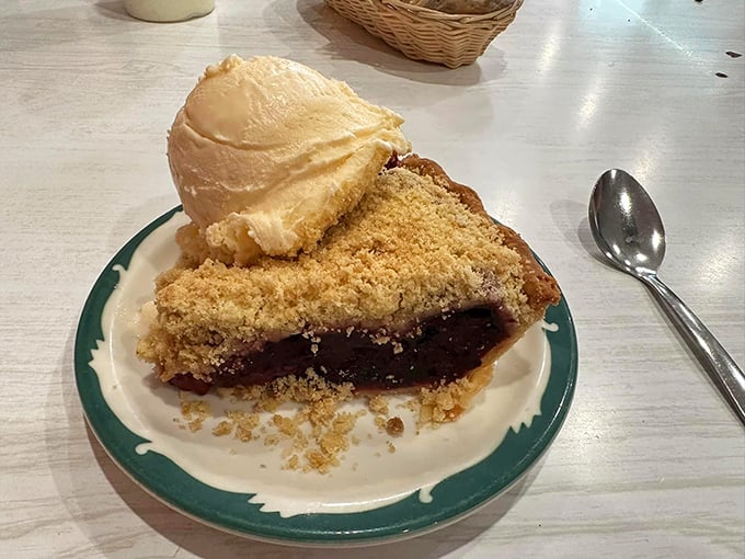Cherry crumb pie with a scoop of vanilla ice cream – the kind of dessert that makes you understand why people write songs about American pie.