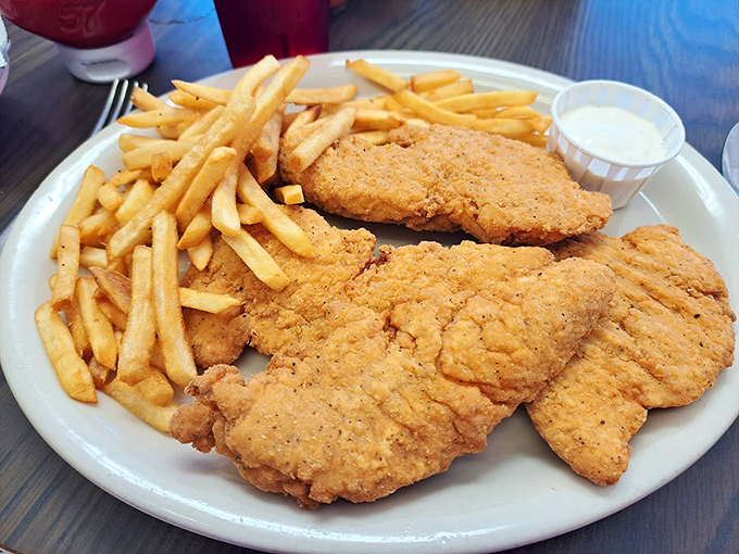 Chicken tenders and fries—proof that sometimes the simplest pleasures are the most satisfying. Crispy, golden, and utterly unapologetic comfort food at its finest.