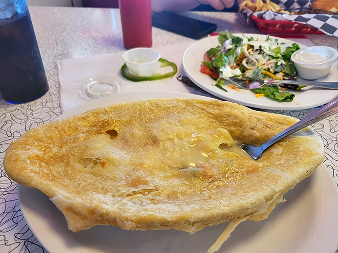 This chicken pot pie isn't just bubbling—it's performing a golden-crusted aria of comfort that deserves a standing ovation.