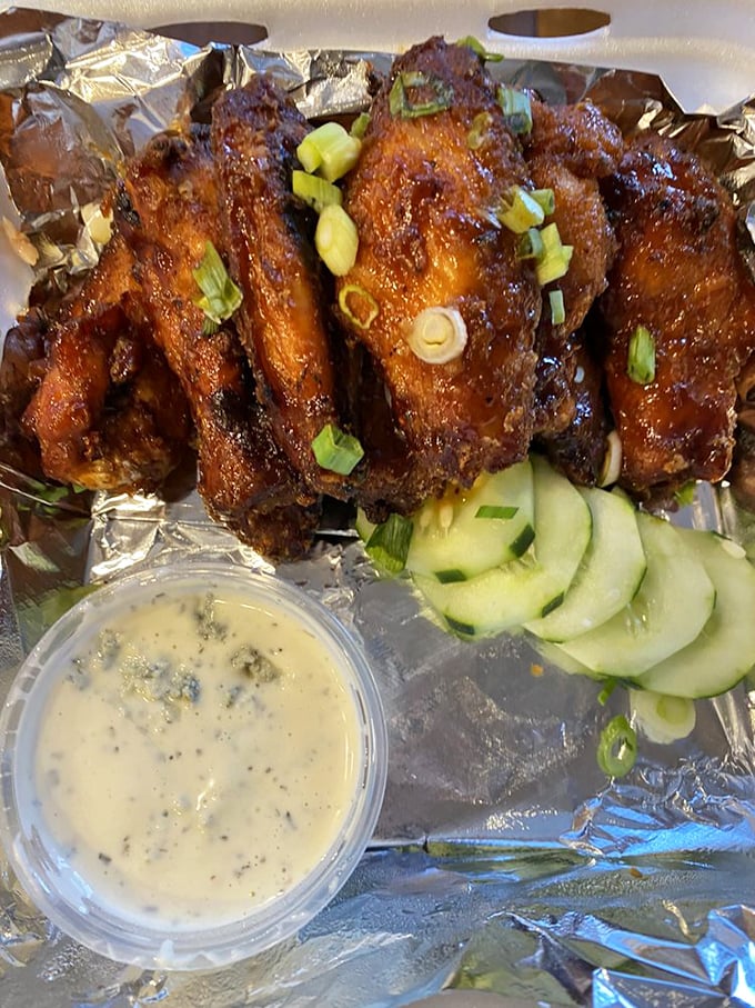 Wings that have clearly been to flavor school and graduated with honors. That glistening sauce promises a symphony of sweet heat. 