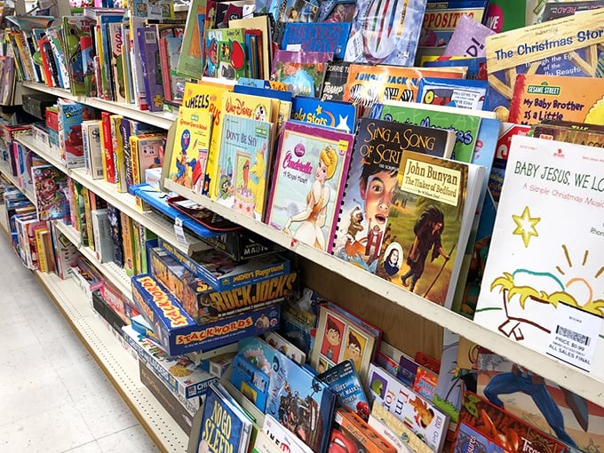 Children's books stacked like colorful dominoes, waiting to inspire the next generation or resurrect memories of bedtime stories past. 