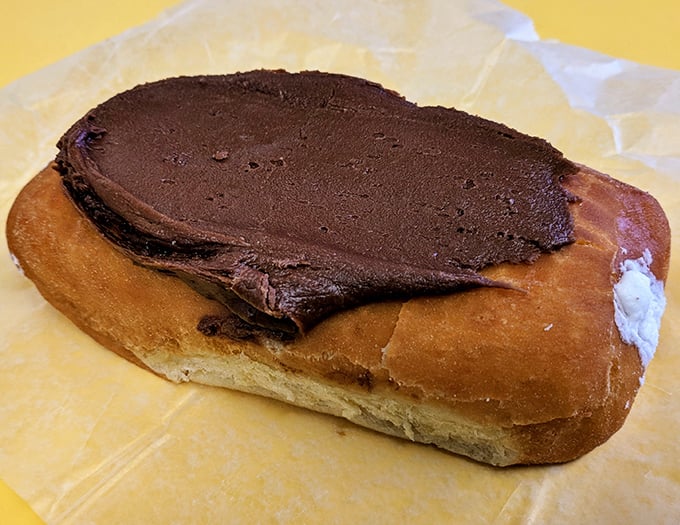 This chocolate-topped creation isn't just a donut—it's what breakfast dreams are made of when you've been very, very good.