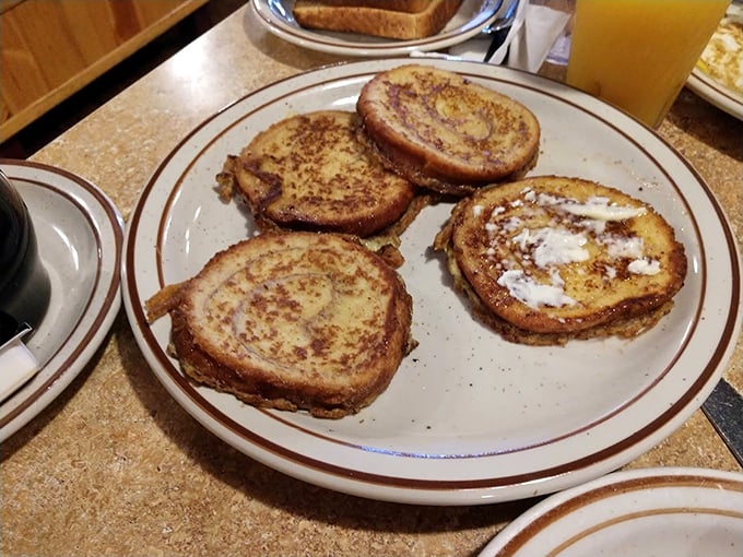 French toast that crossed paths with cinnamon and never looked back. Each slice tells the story of bread that found its higher calling in breakfast form.