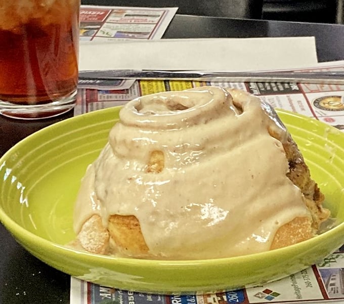 This cinnamon roll isn't just breakfast—it's an event. Gooey, spiraled perfection that makes Monday mornings bearable and diets impossible.