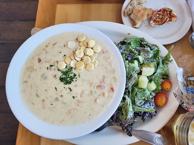 This isn't just clam chowder—it's a creamy ocean hug in a bowl. Those oyster crackers are about to experience the dive of their lives.