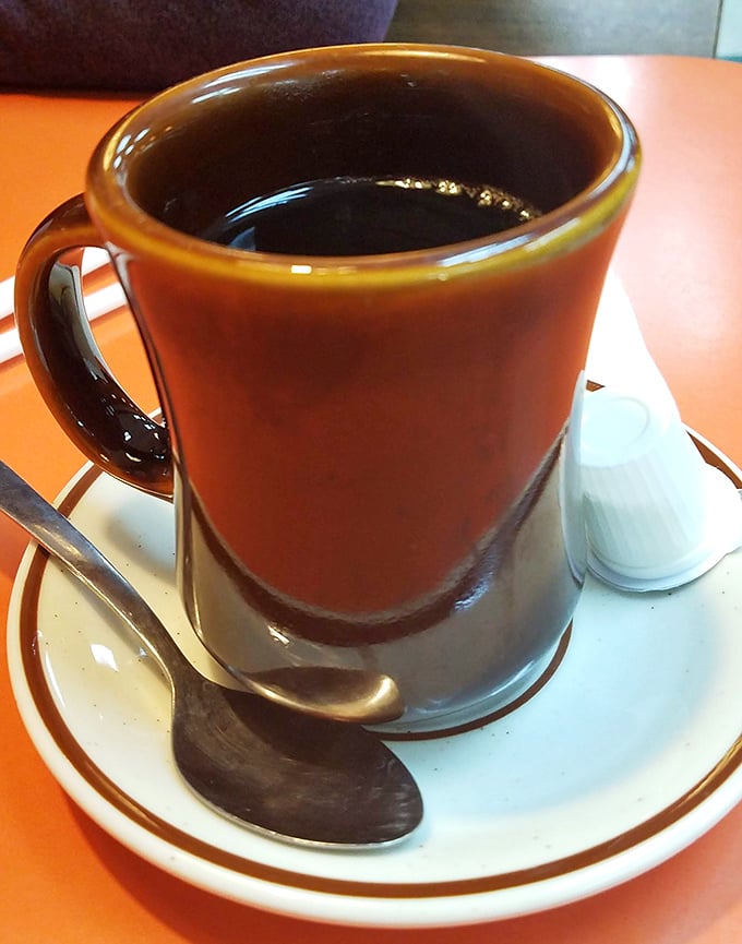 That sturdy diner mug promises coffee that tastes like America—strong, straightforward, and ready to get you through anything the day throws at you.