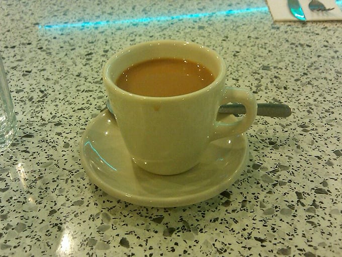 This isn't just coffee—it's liquid motivation in a classic diner mug. No foam art needed when the flavor speaks for itself.
