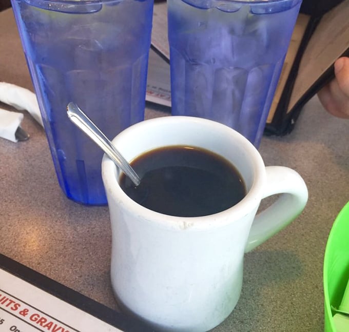 The classic diner coffee mug—sturdy, unpretentious, and promising unlimited refills. No fancy latte art needed when the coffee's this good.