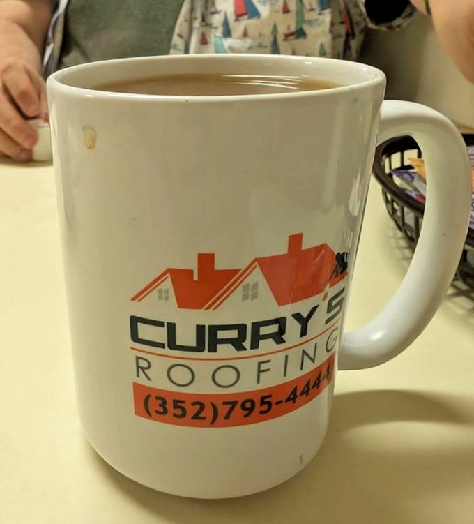 Coffee served in a local business mug – that's how you know you're in a place where community matters more than fancy china. 