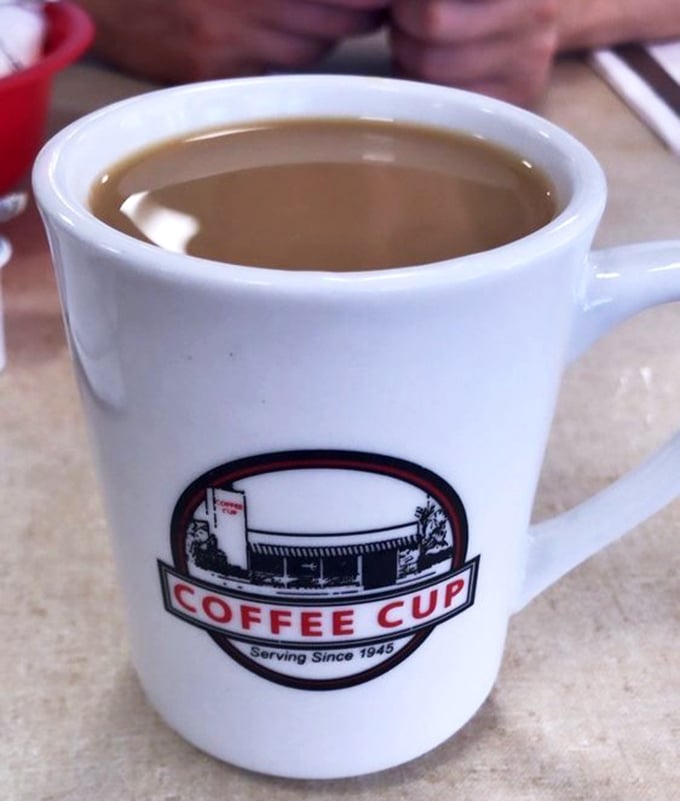 The mug says it all – straightforward, honest coffee that doesn't need a fancy Italian name or artisanal foam art to wake you up properly.