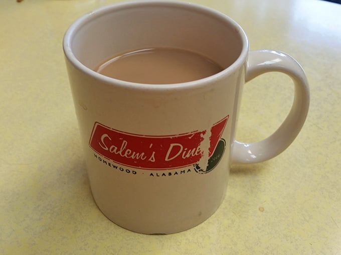 This isn't just coffee—it's liquid motivation in a mug that proudly declares its Homewood, Alabama heritage with every sip.