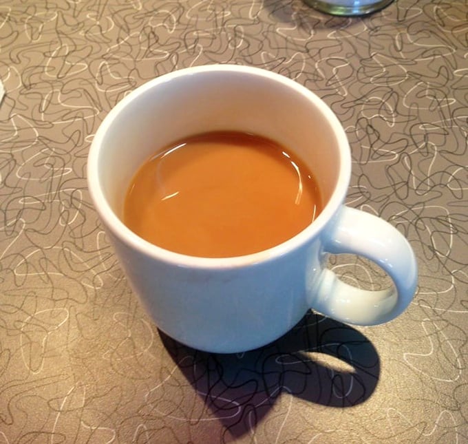 The humble coffee mug – holding what might be the most important relationship of your morning in its warm ceramic embrace.