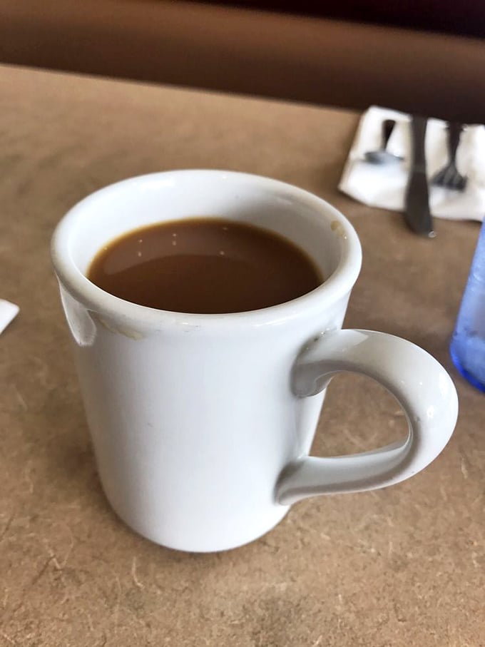 A simple white mug holding liquid motivation. In a world of frappuccino-mocha-whatevers, there's something revolutionary about just good coffee.