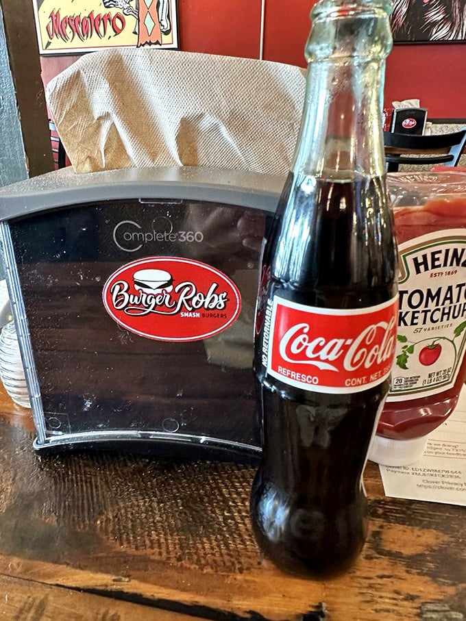 The Mexican Coke in glass bottles—with real sugar instead of corn syrup—is the perfect companion for cutting through burger richness.