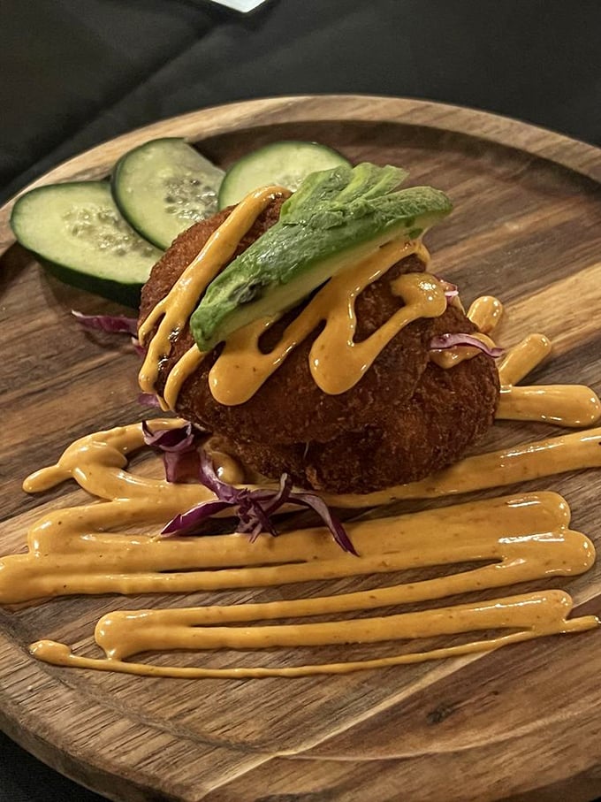 This crab cake isn't hiding behind fillers or fancy sauces—it's the seafood equivalent of a confident person who knows their worth.