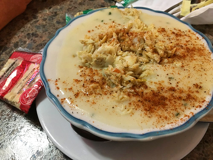 Cream of crab soup that's practically a religious experience. The Old Bay sprinkled on top isn't just seasoning—it's Maryland's version of fairy dust.