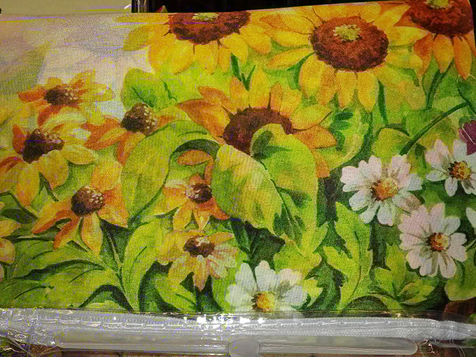 Sunflowers bloom eternally on canvas, bringing perpetual summer into Delaware homes regardless of the season outside—no watering required.