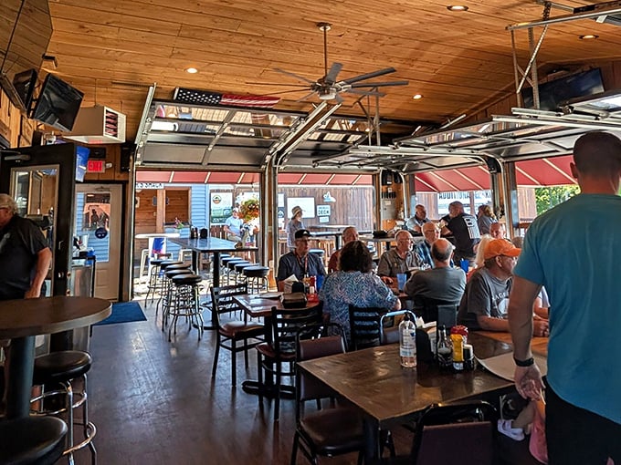 The outdoor patio—where summer evenings stretch longer, conversations flow easier, and somehow food tastes even better under string lights.