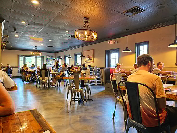 The dining room buzzes with the universal language of barbecue appreciation—the satisfied nods and occasional sauce-stained grins.