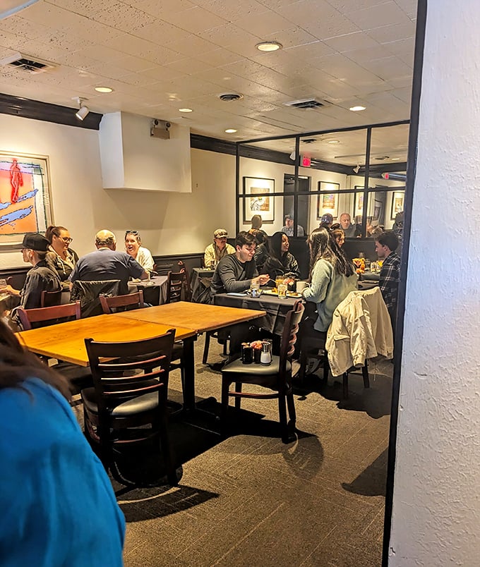The dining room buzzes with the energy of satisfied patrons—a symphony of clinking glasses and appreciative murmurs.