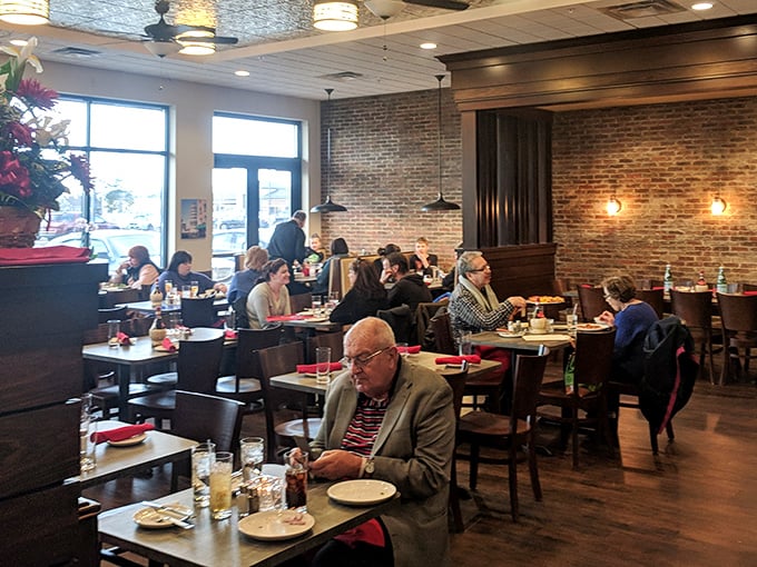 The dining room hums with the universal language of good eating—forks twirling, glasses clinking, and the occasional "you've got to try this."