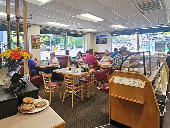 Morning light streams through windows as diners settle into that comfortable rhythm of coffee sips and conversation—Hood River's breakfast ritual in full swing.