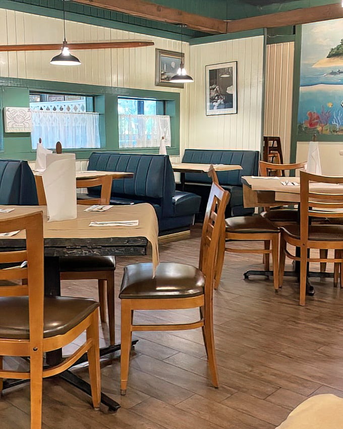 Clean, bright, and ready for action—this dining room has witnessed more happy food comas than a Thanksgiving reunion.