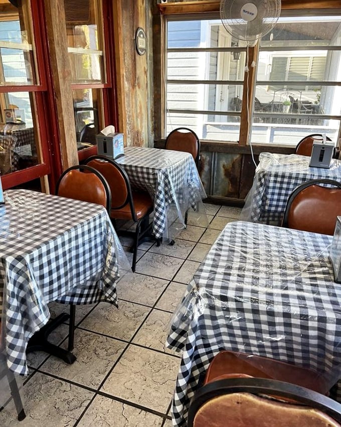 Black and white checkered tablecloths: the universal signal that you're about to eat something that makes your doctor nervous but your soul happy.