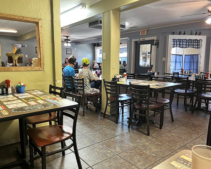 The dining room hums with the beautiful symphony of forks against plates and coffee cups clinking – the universal soundtrack of diner contentment.