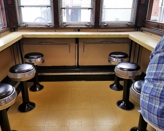 Democracy in dining form. Gilley's counter seating puts everyone—from truck drivers to professors—shoulder to shoulder in pursuit of deliciousness.