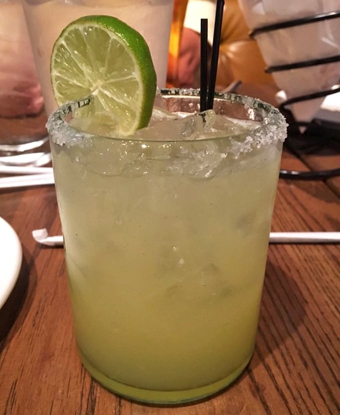 A margarita with the perfect salt rim—like the cocktail equivalent of finding extra fries at the bottom of the bag. Life's little victories.