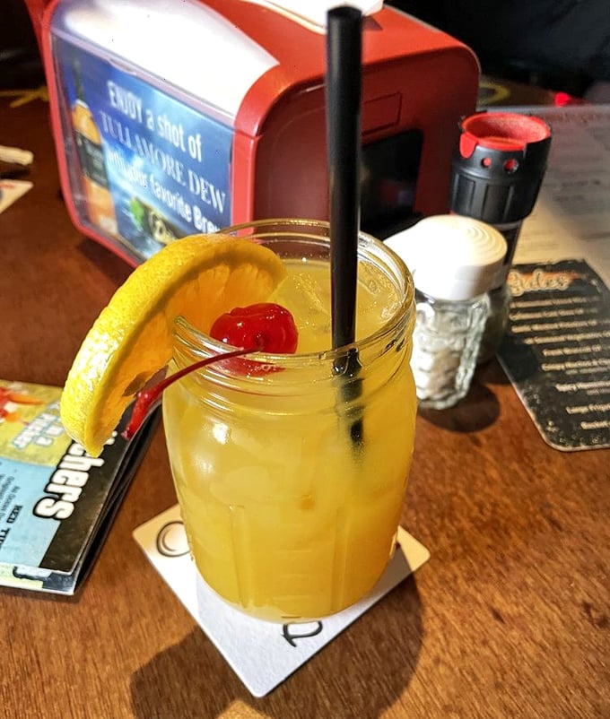 This isn't just a cocktail—it's liquid Florida sunshine garnished with a cherry that's having more fun than most people on vacation.