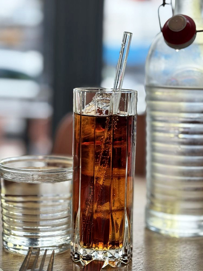 A perfectly crafted cocktail awaits its starring role in your evening's narrative—the supporting actor that often becomes the hero.