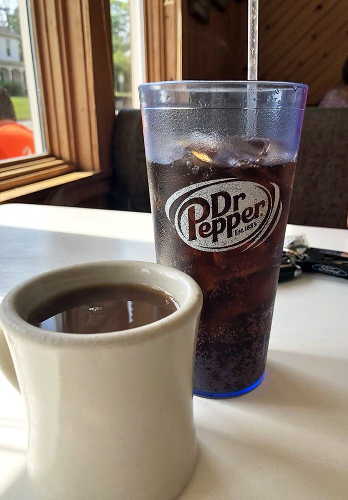 The classic pairing – a steaming cup of diner coffee alongside an ice-cold Dr. Pepper, because sometimes you need both kinds of fuel.