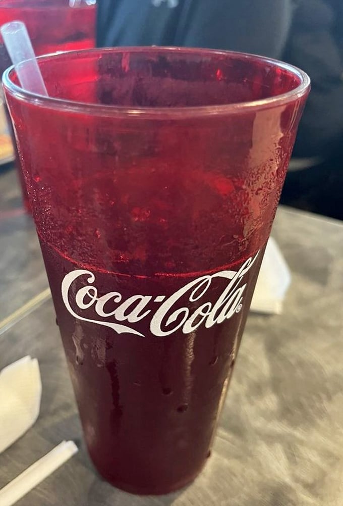 8. An ice-cold Coca-Cola in a classic glass—sometimes the simplest pleasures are the perfect companion to a hearty meal. That condensation tells you it's properly chilled!
