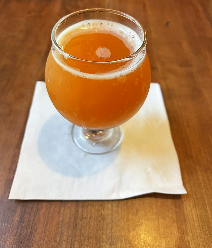 Amber nectar in a goblet—this craft beer is the perfect companion for a barbecue journey, cutting through richness with hoppy delight.
