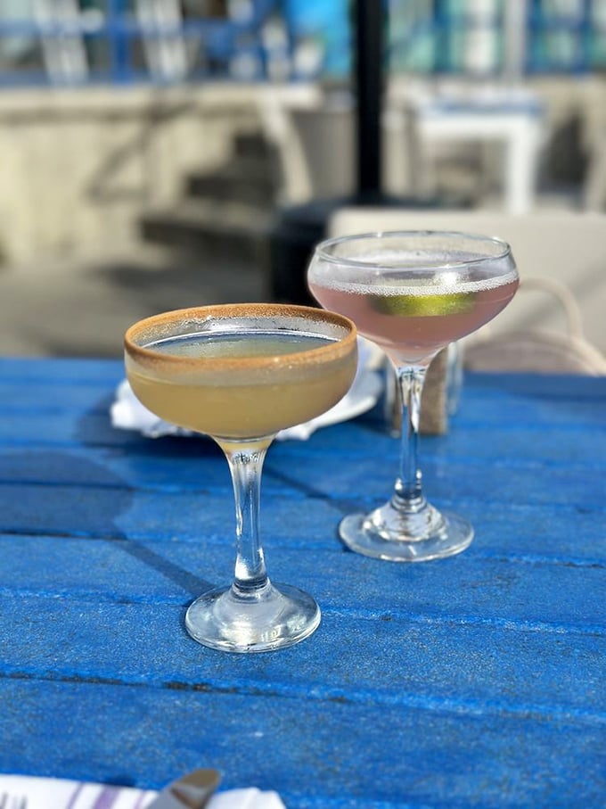 Cocktails with ocean views—nature's perfect pairing. These aren't just drinks; they're liquid souvenirs of a coastal afternoon well spent.