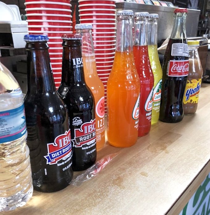 The beverage lineup at Arbetter's features classic sodas in glass bottles—because some traditions are too good to modernize.